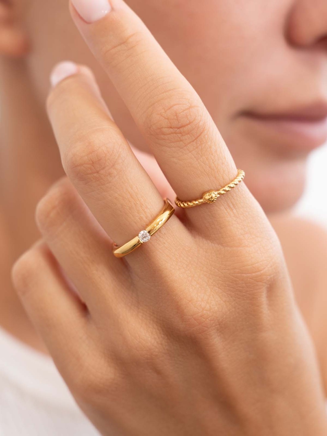 ANILLO ACERO CORAZÓN ENROSCADO